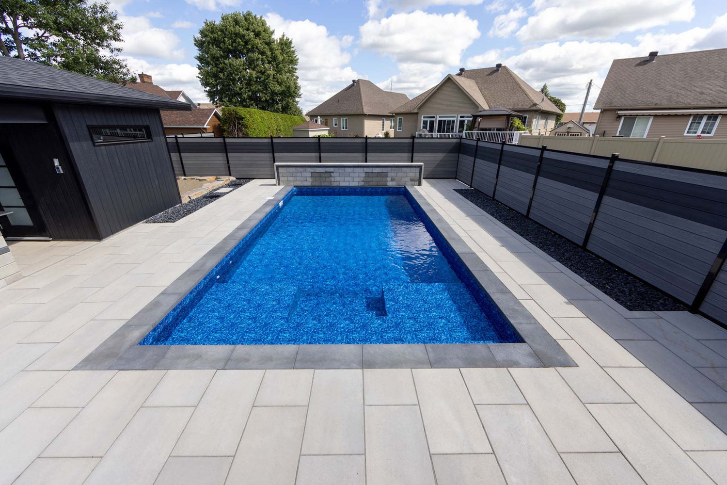 Inground Pool Installation St-Isidore – Modern Pool with Covered Patio