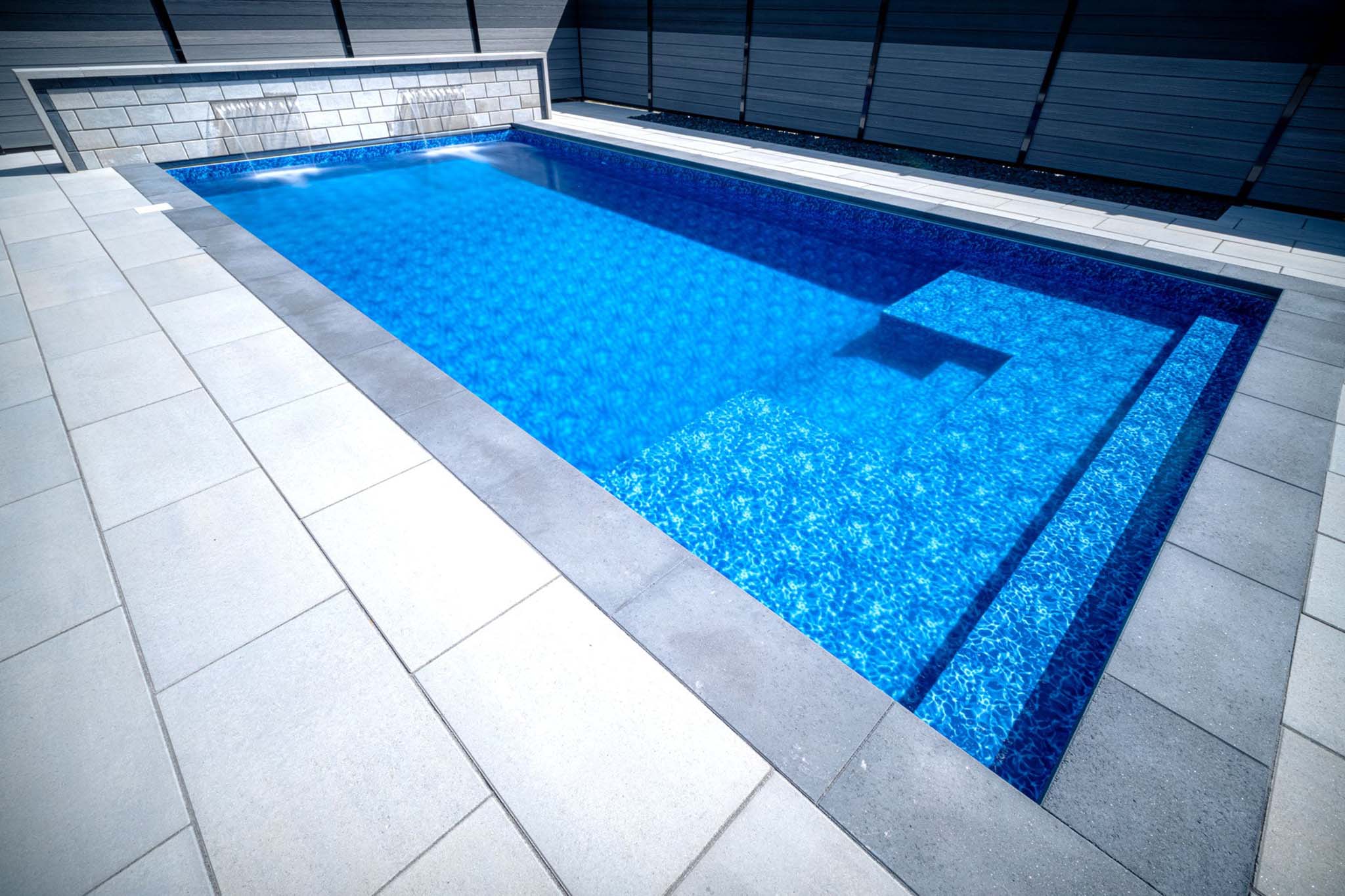 Inground Pool Installation St-Isidore – Modern Pool with Covered Patio