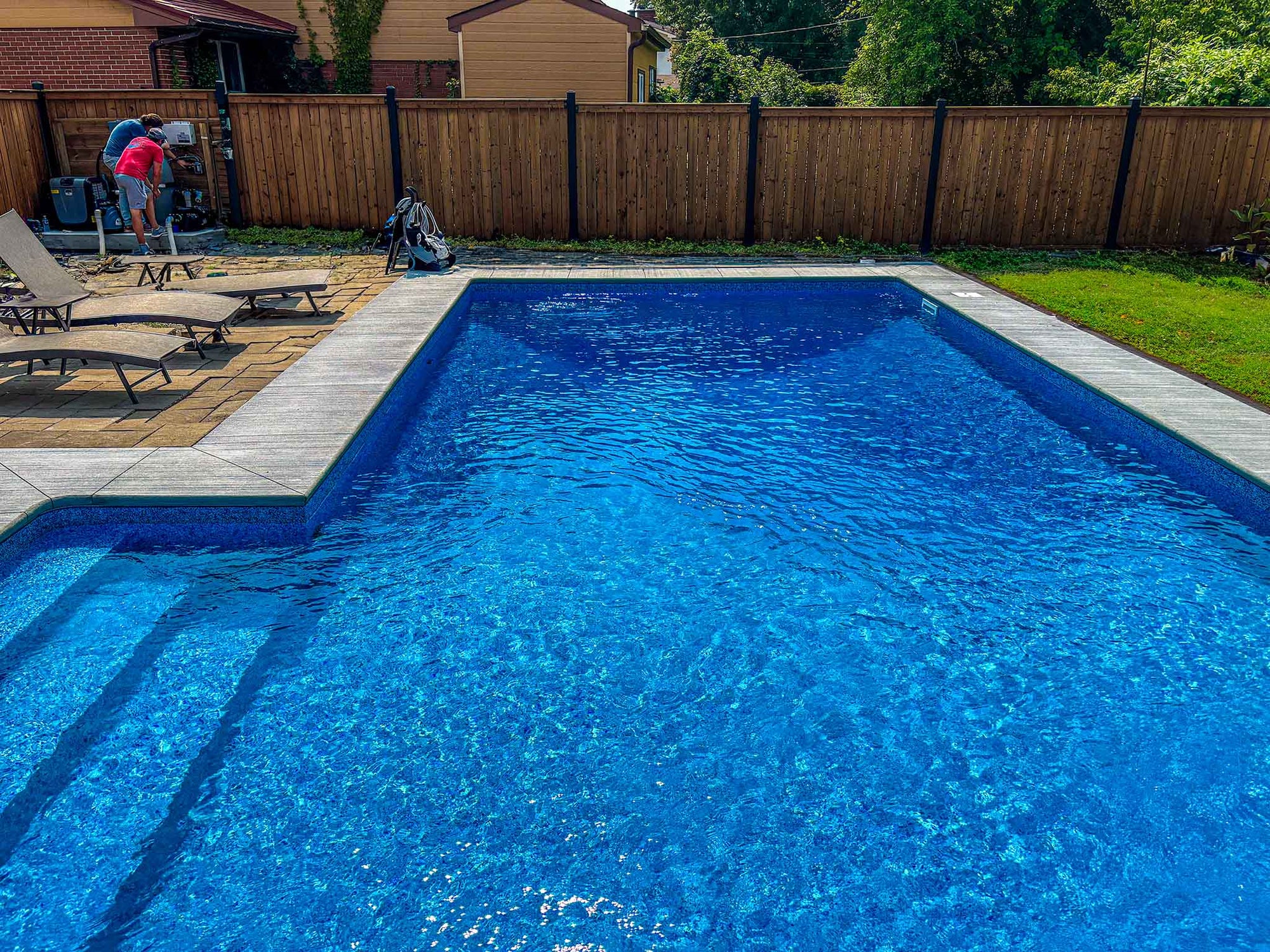 Inground Pool Installation Nepean - Backyard Pool with Wooden Fence